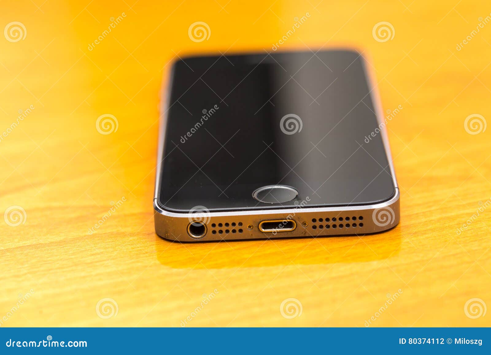 Close Up of Cellphone Lying on Wooden Table Stock Photo - Image of ...