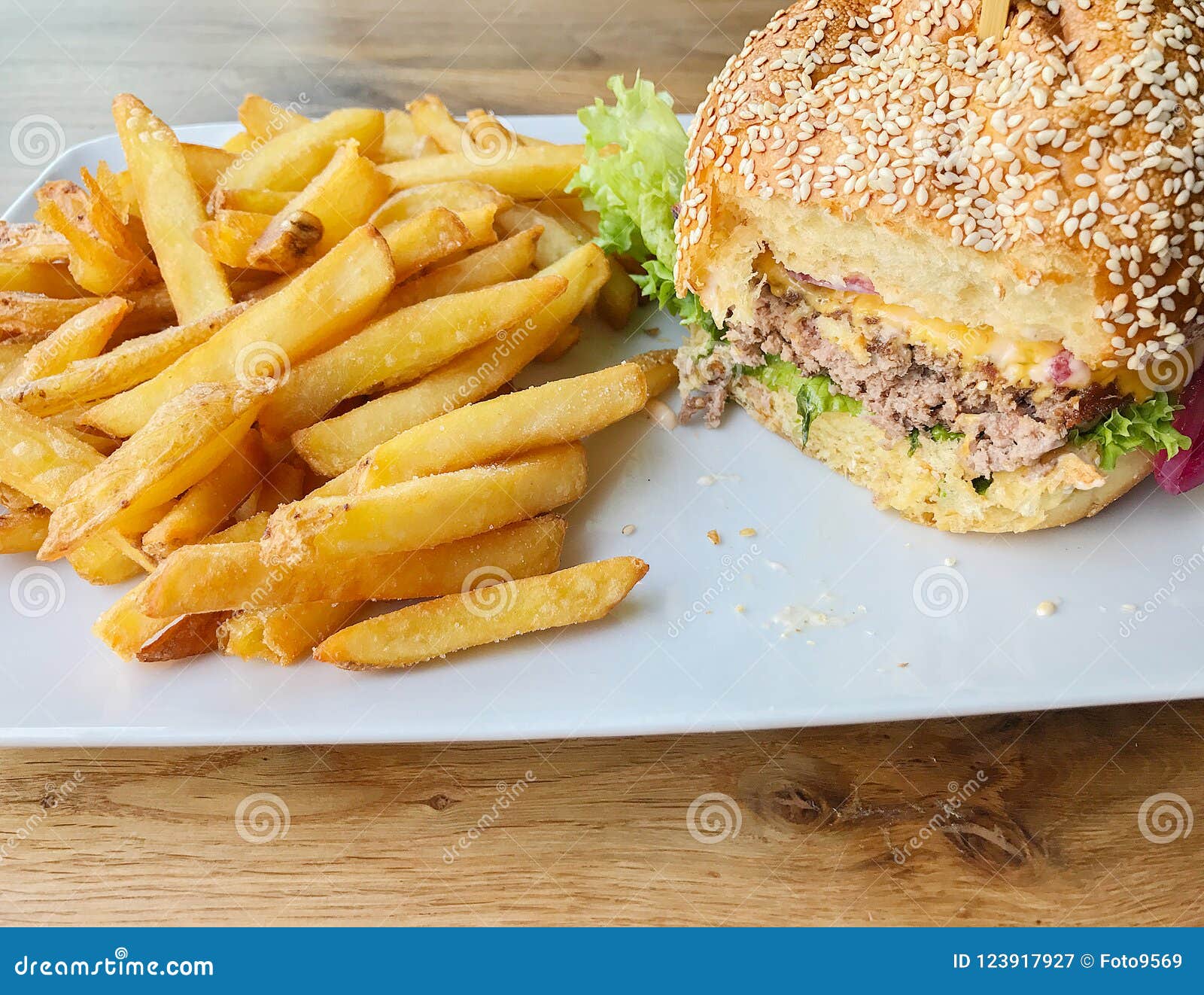 Close-up of a Cheeseburgers on a Plate Stock Image - Image of freshness ...