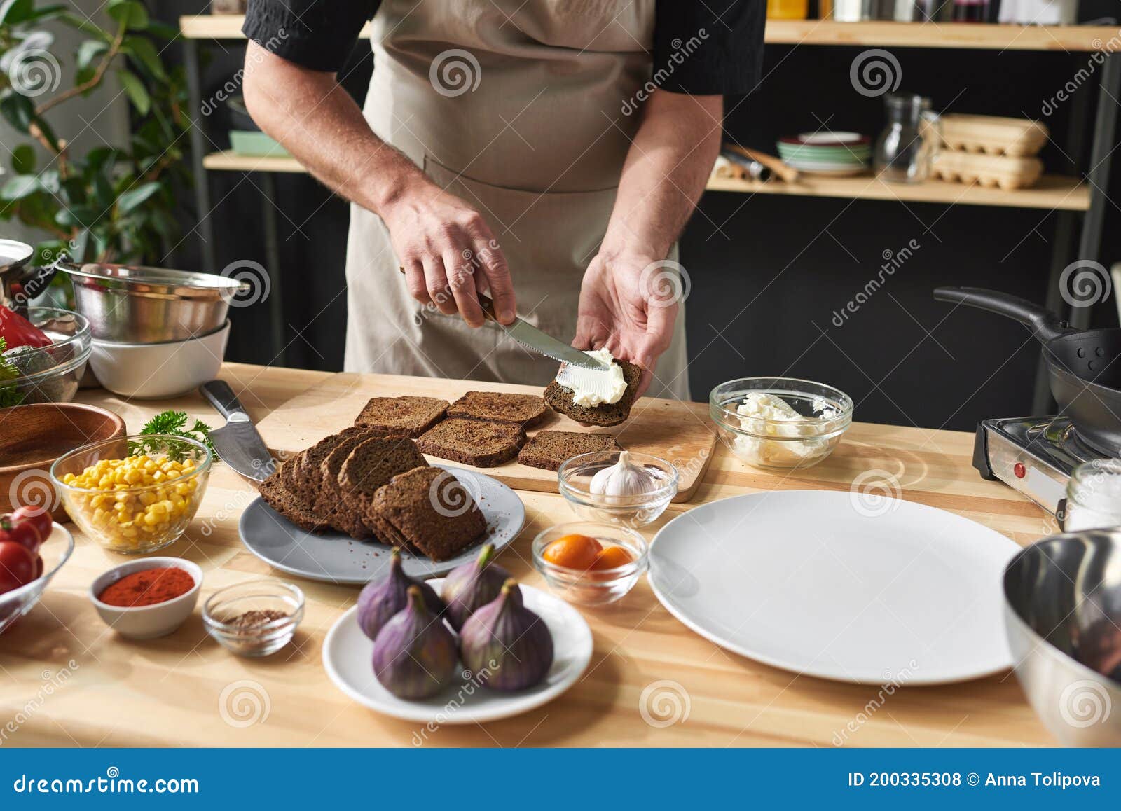 Man preparing toaster stock photo. Image of bowl, standing - 200335308