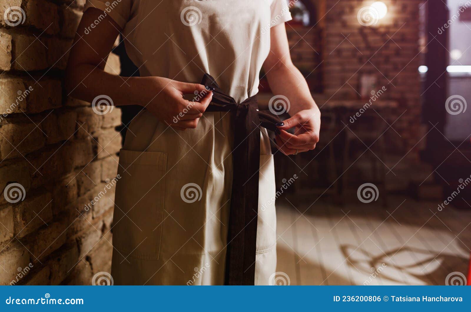 Close-up of Chef Chef Girl Tying Apron Ready for Work Stock Photo ...