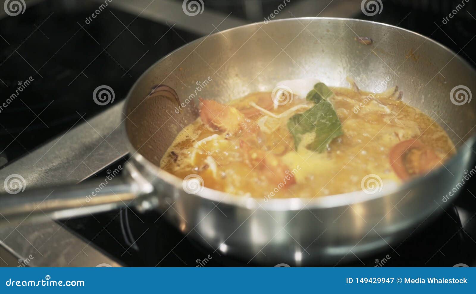 Close-up of Chef`s Hand Boiling Some Dish on a Kitchen at the ...