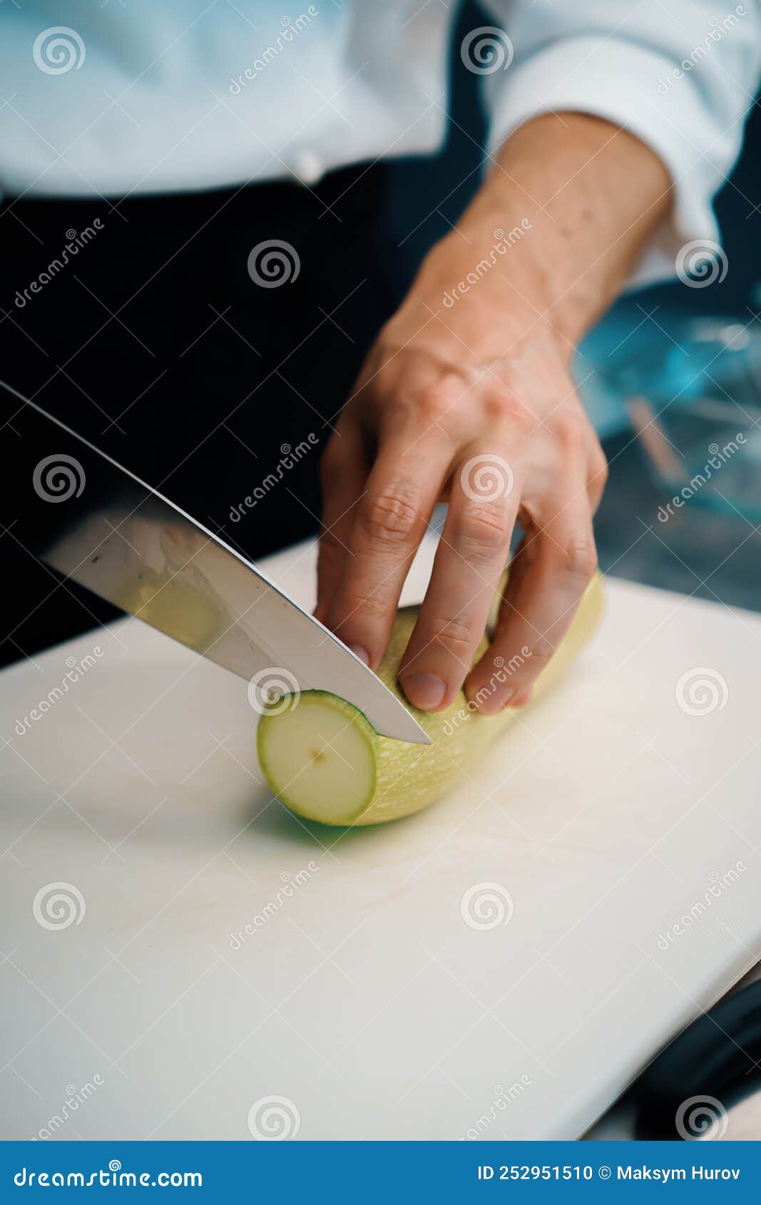 Close-up of a Chef Slicing Zucchini in a Professional Restaurant ...