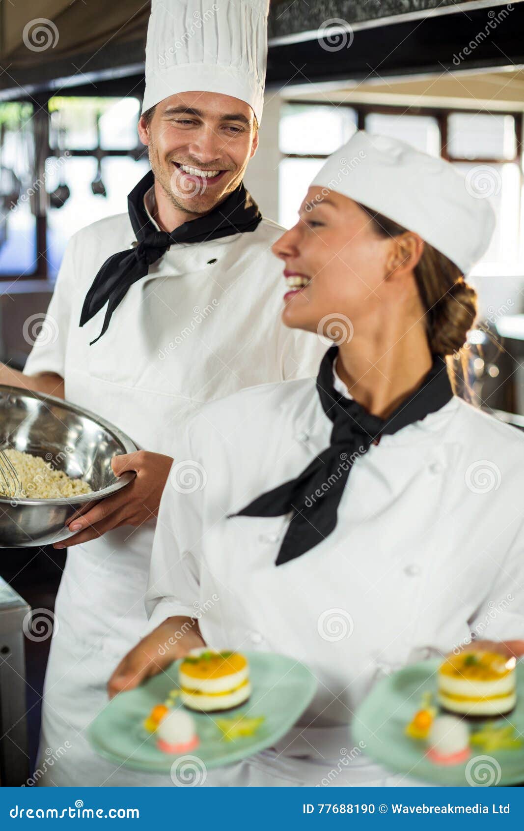Close-up of Chefs Smiling while Working in Kitchen Stock Photo - Image ...