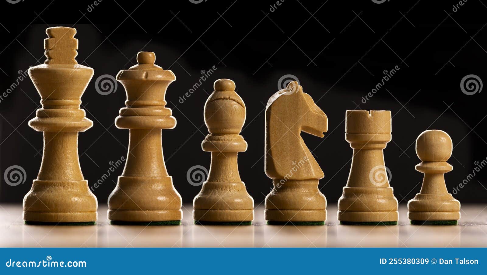 Close Up of Chess Pieces Against Black Background Stock Image - Image ...