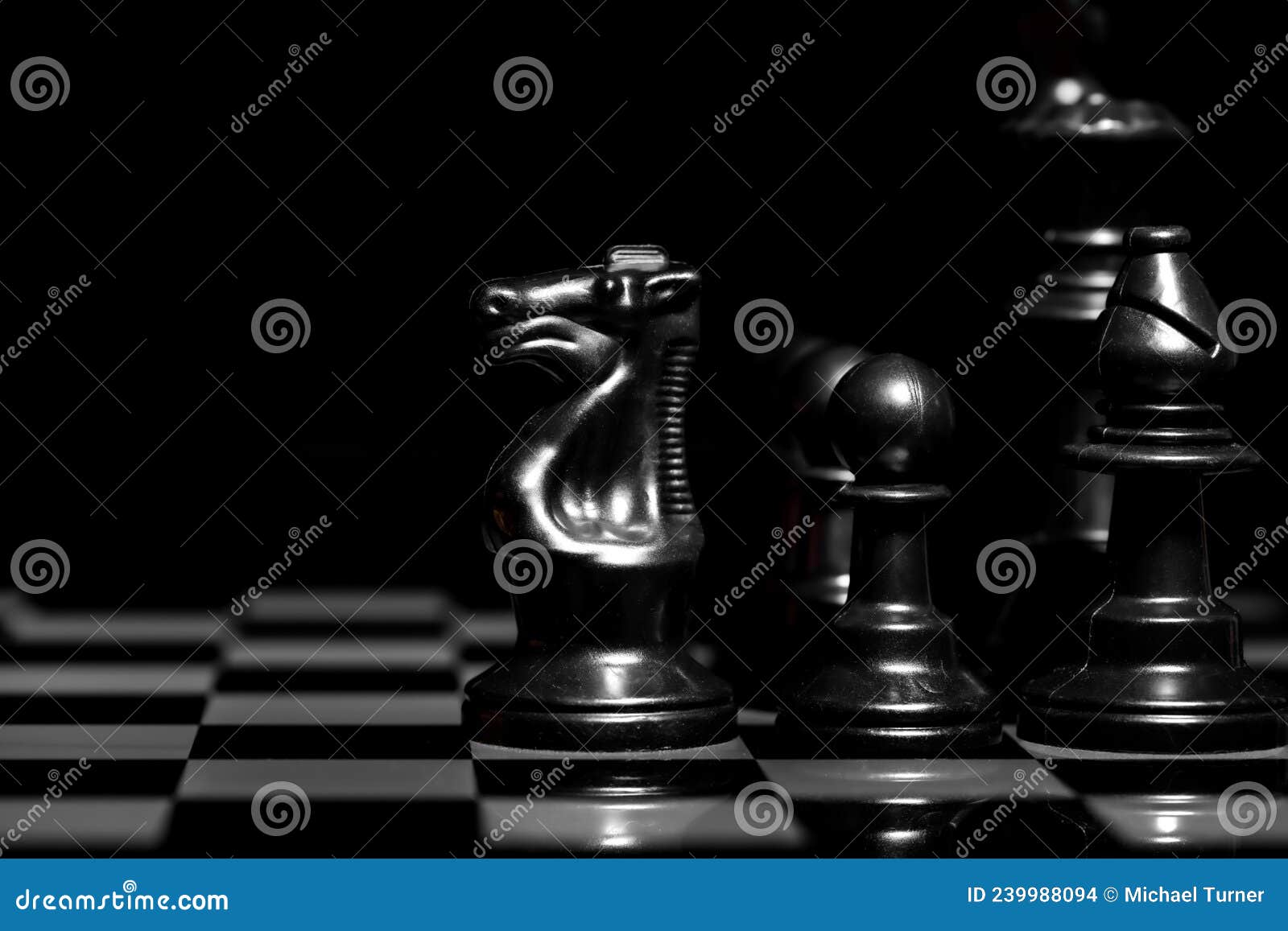 Close Up of Chess Pieces on a Reflective Mirror Board Surface with ...