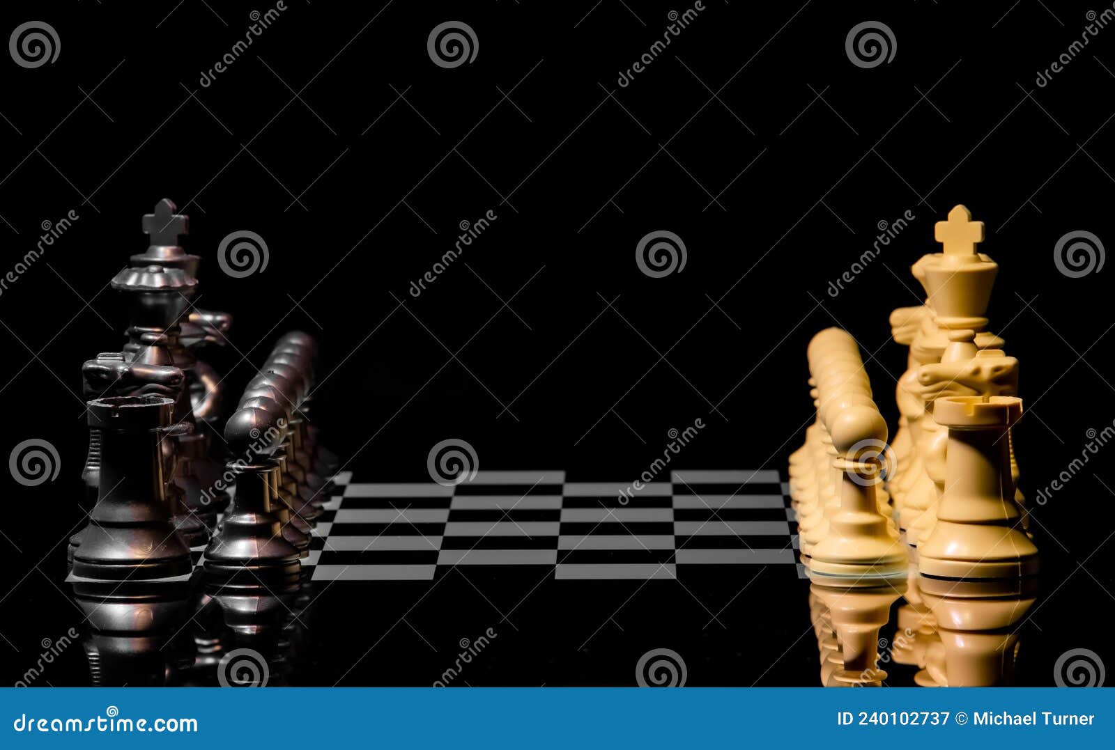 Close Up of Chess Pieces on a Reflective Mirror Board Surface with ...
