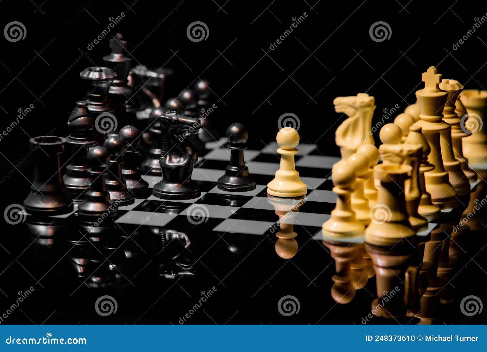 Close Up of Chess Pieces on a Reflective Mirror Board Surface with ...
