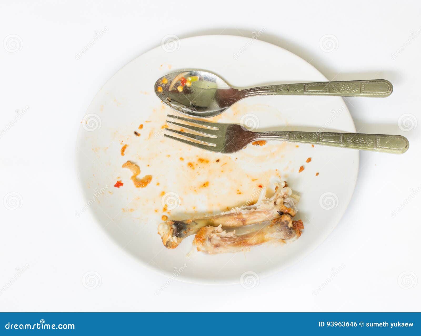 Close Up of Chicken Bone on the White Dish with with Waste Food Stock ...
