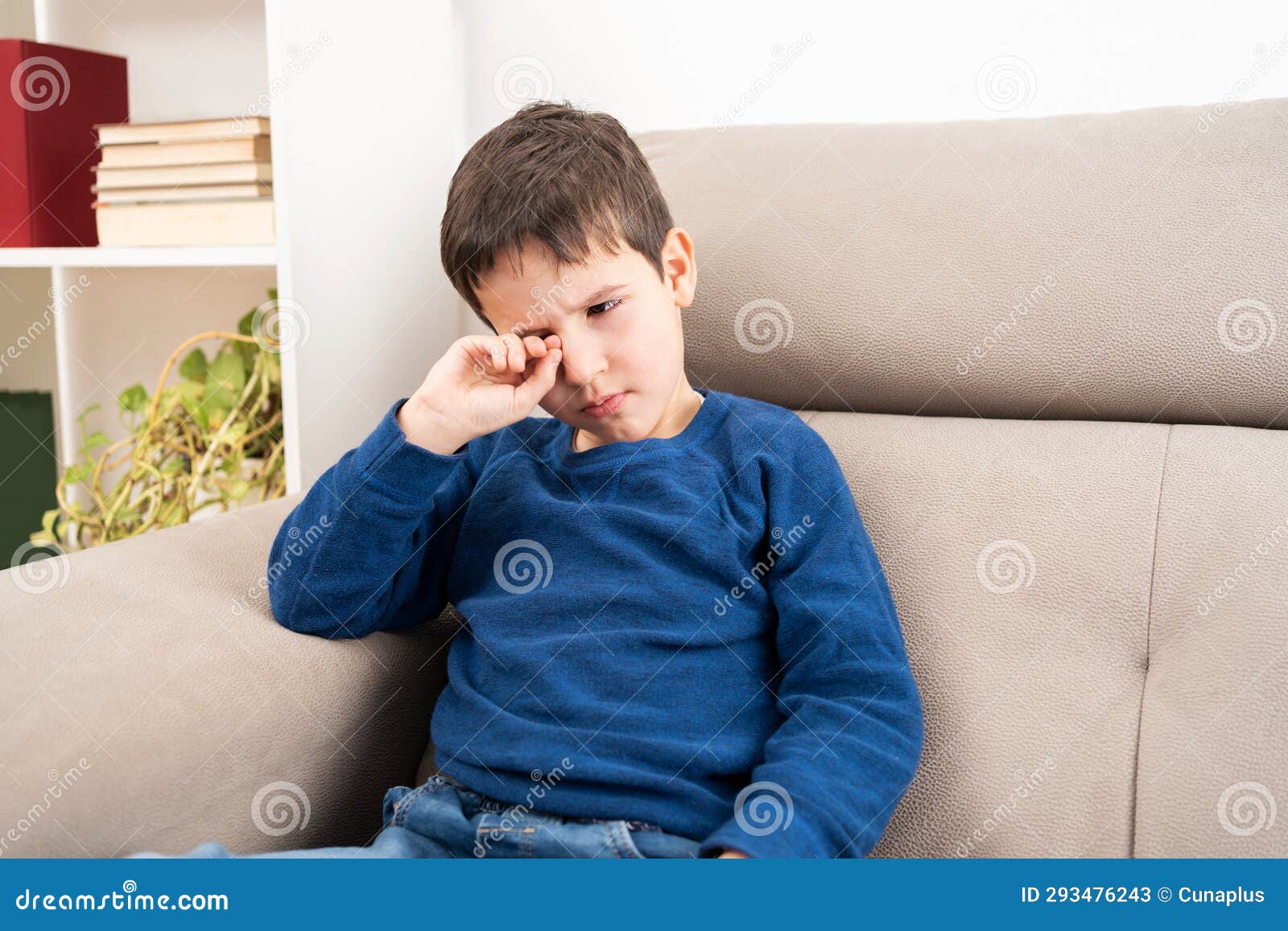 Child Scratching Their Arm With Visible Redness And Rash, Indicating ...