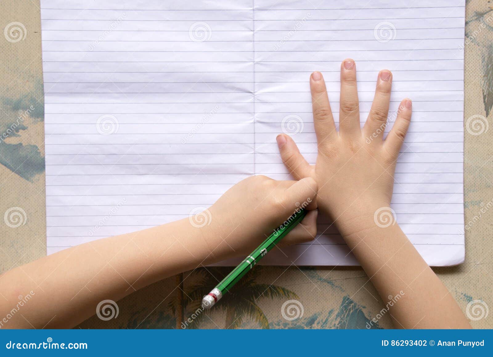 Close Up Children are Holding a Pencil and Writing. Stock Photo - Image ...