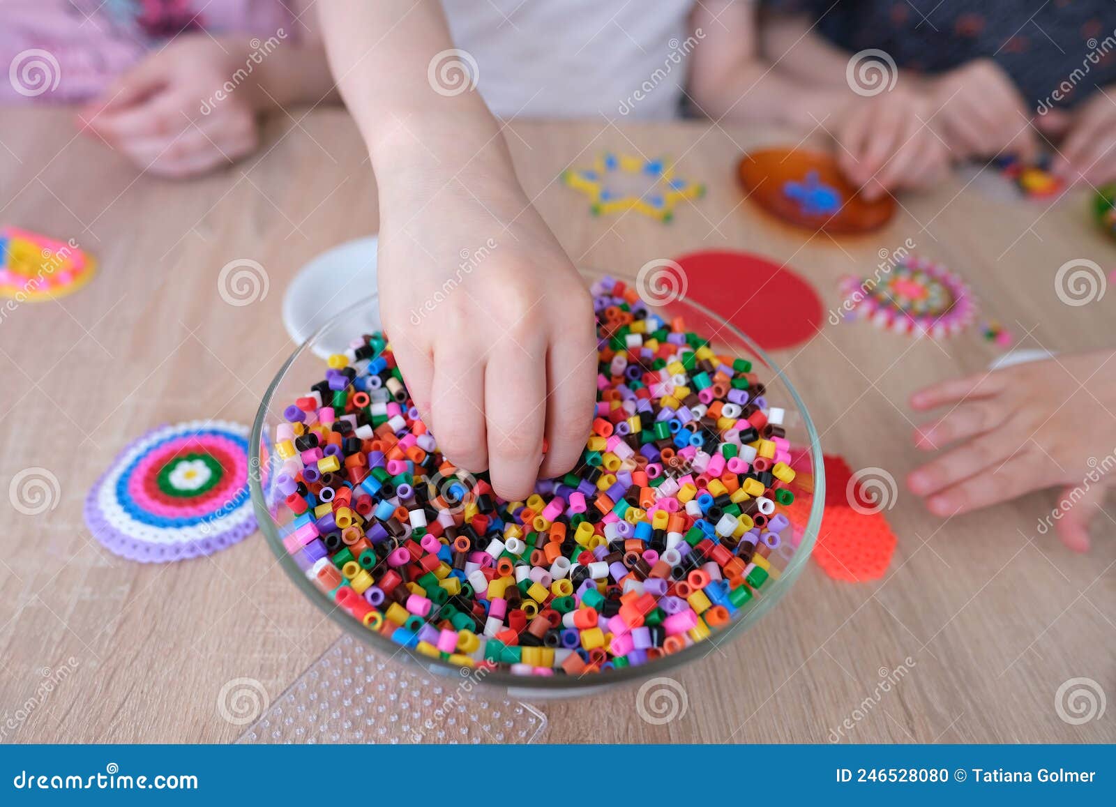 Close-up of Children`s Hands Creating Perler Bead Patterns, Make Crafts ...