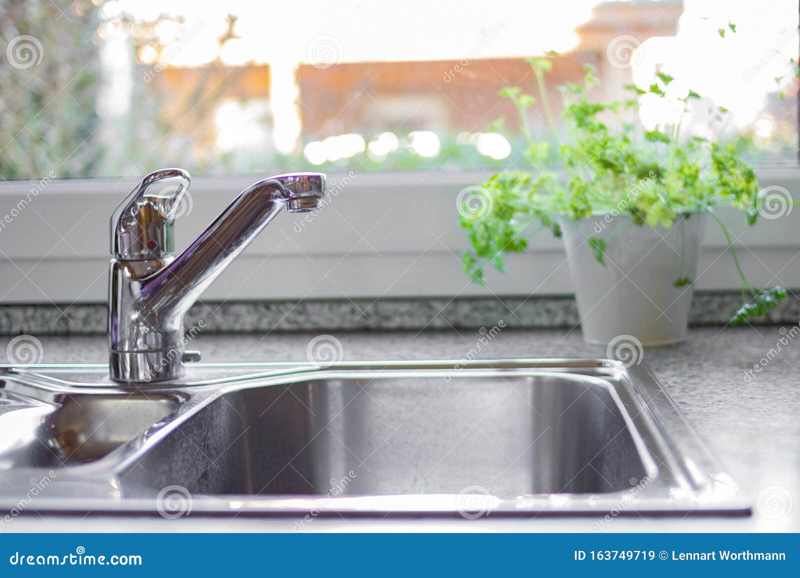 Front View Close Up Chrome Kitchen Sink and Counter Top Background with ...