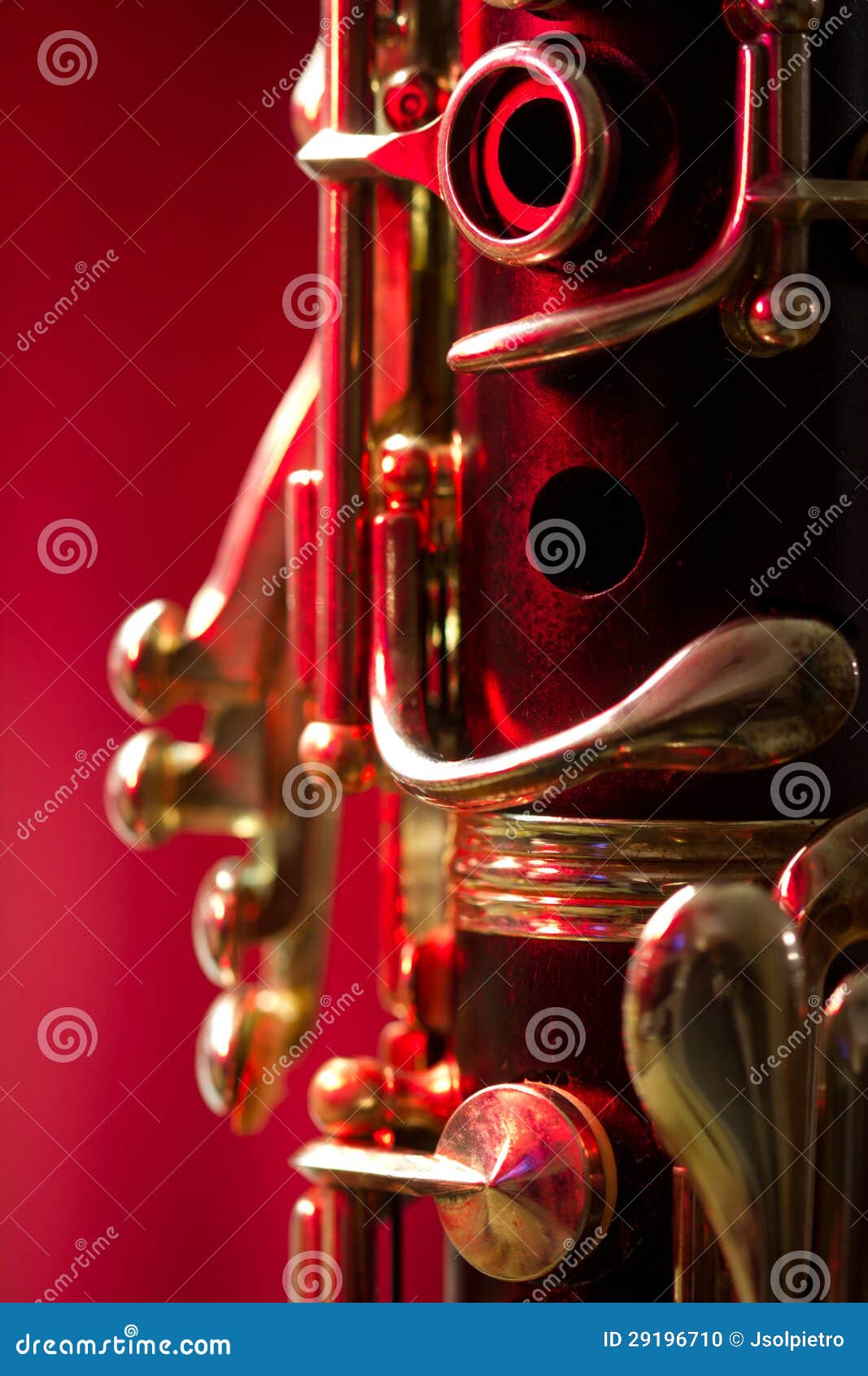 Close-up of a Clarinet Against a Red Background Stock Photo - Image of ...
