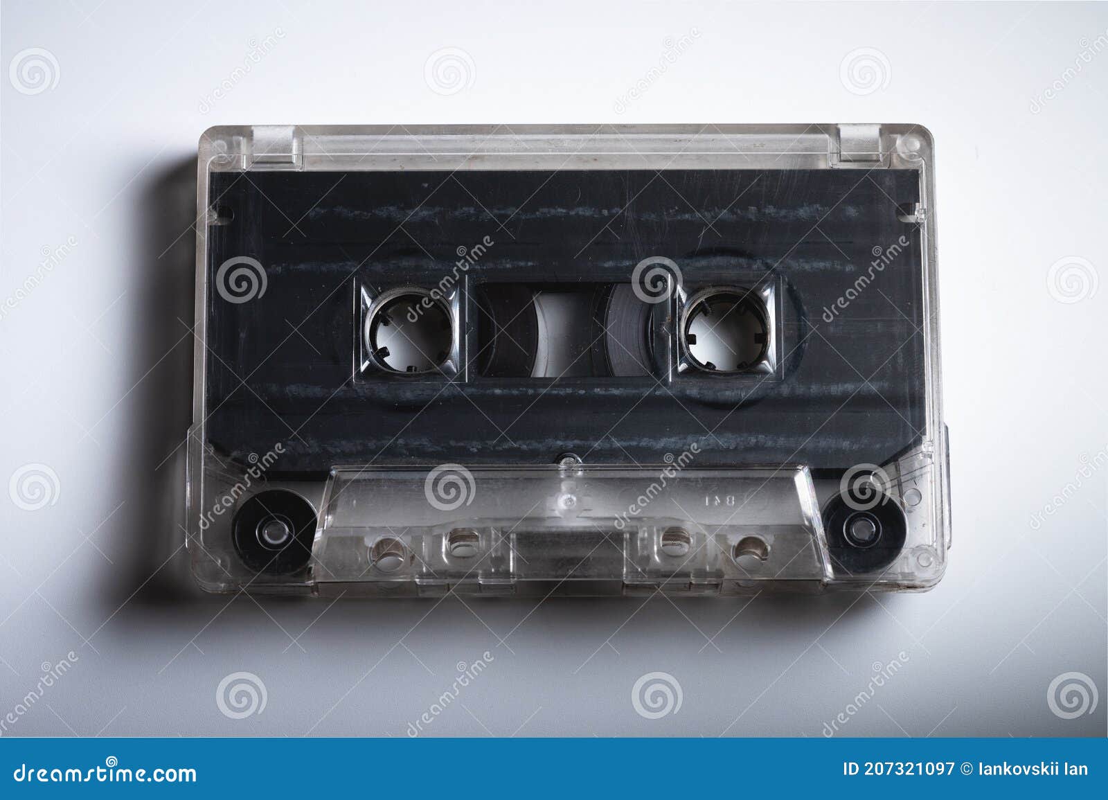 Close-up of a Classic Audio Cassette Tape with Magnetic Tape Inside ...