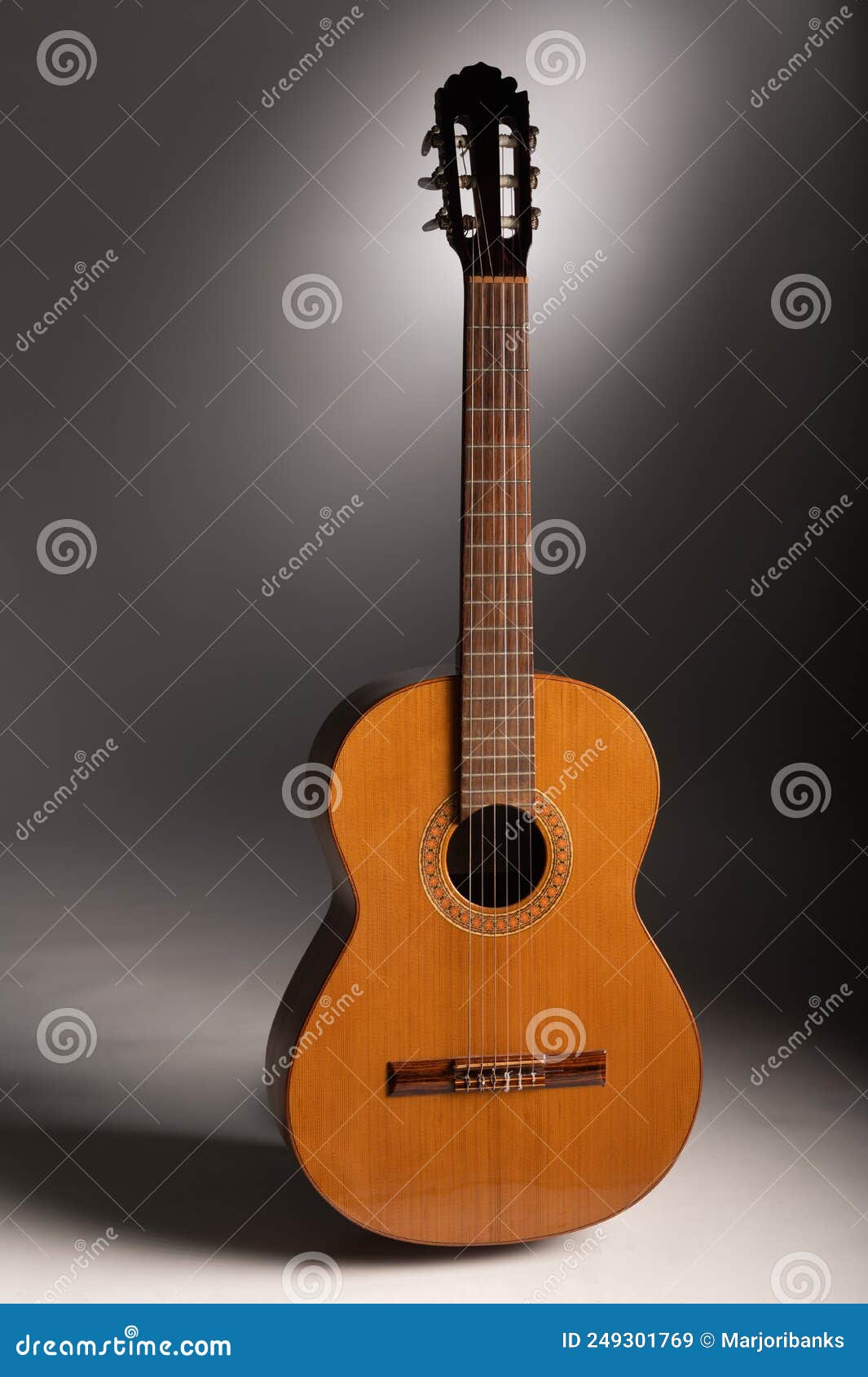 Classical Guitar on a Grey Background with Copy Space Stock Image ...