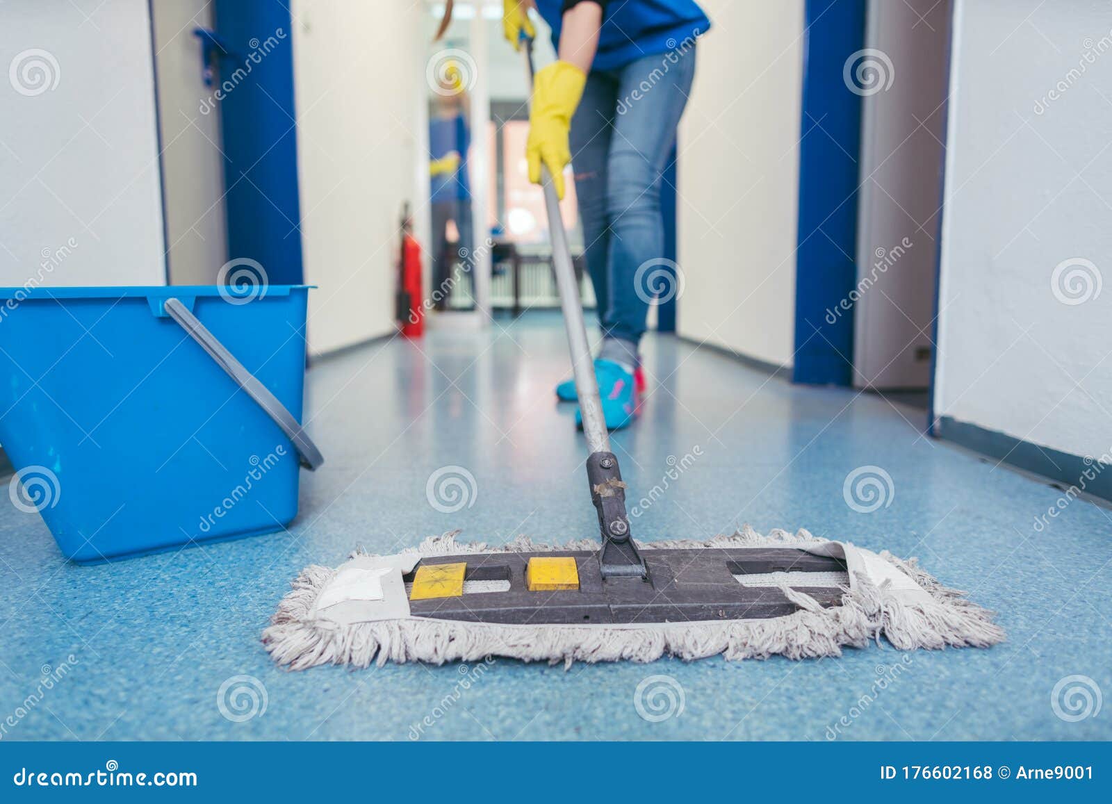 Close-up of Cleaners Moping the Floor Stock Photo - Image of woman ...
