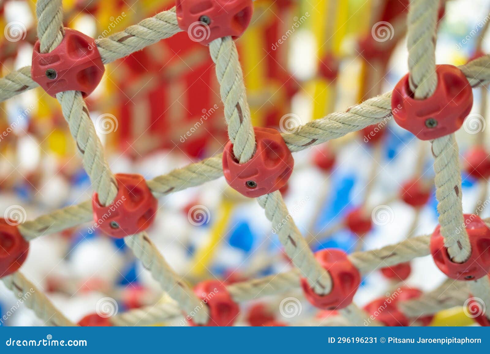 Close-up of a Climbing Net in a Play Park with Small Balls on the Floor ...