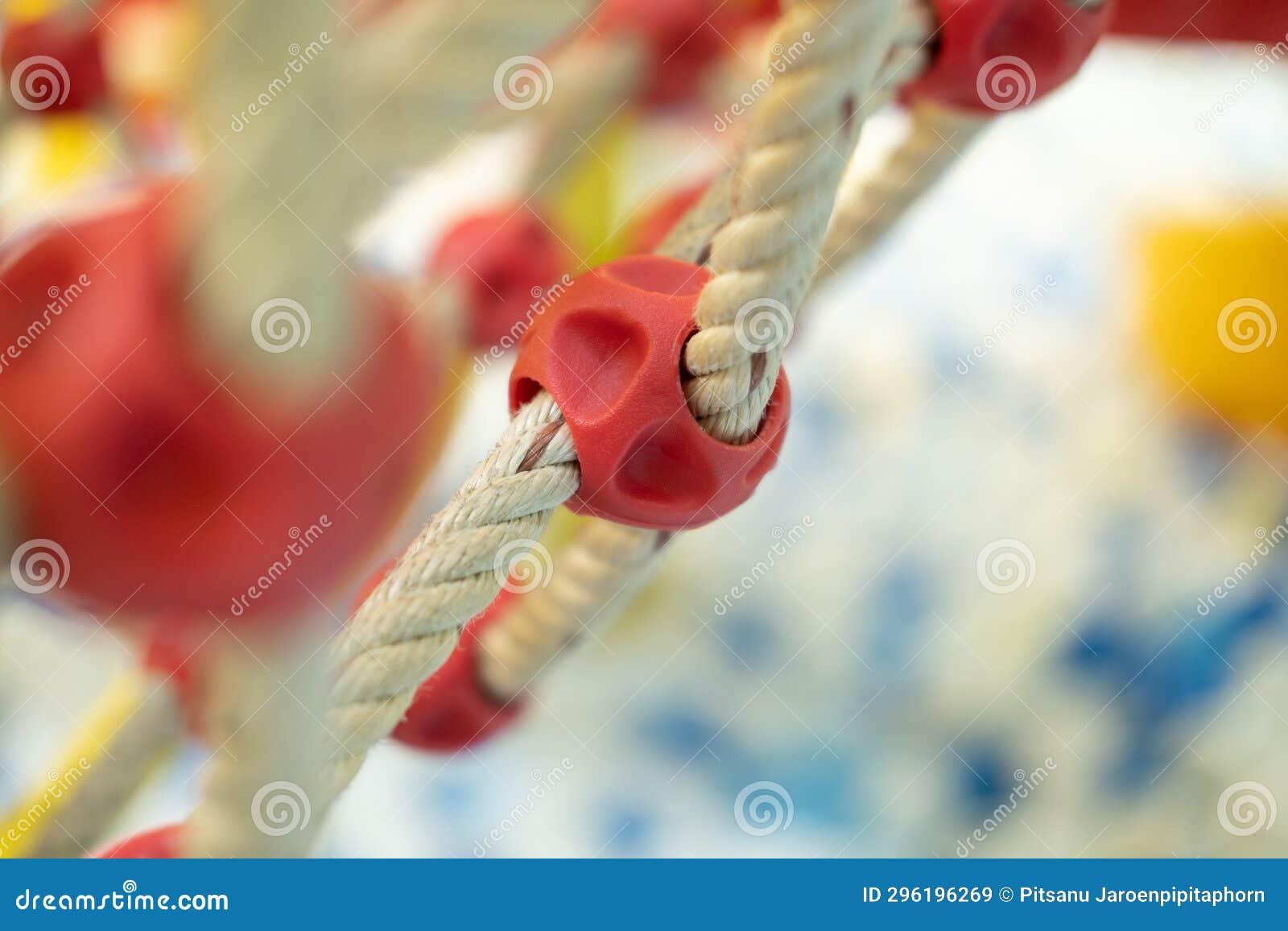 Close-up of a Climbing Net in a Play Park with Small Balls on the Floor ...