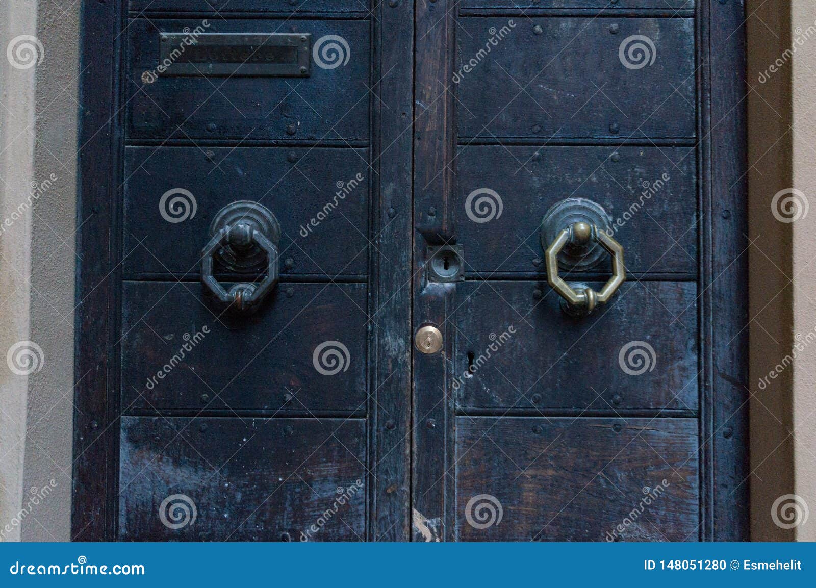 Close Up of Closed Heavy Wooden Doors with Octagon Door Handle Stock ...