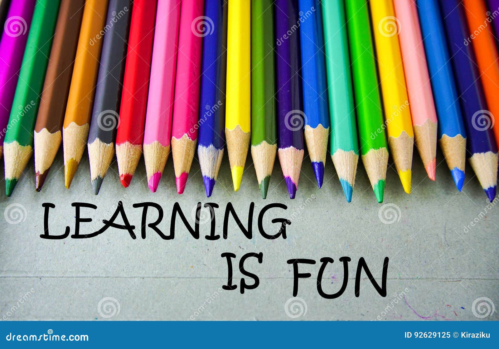 Close Up Colored Pencil Writing with LEARNING is FUN .Education Concept ...