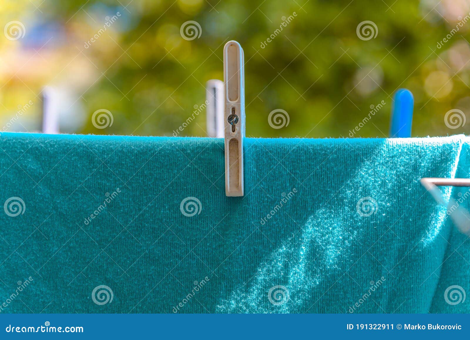 Close-up of Colorful Laundry Pins and Hanged Clothes Drying Stock Image ...