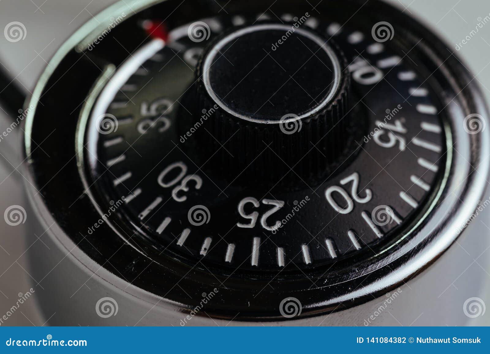 Close Up of Combination Lock with Circle of Numbers and Code To Unlock ...