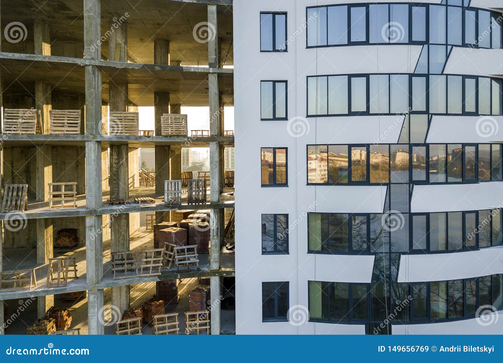 Close-up Comparison Of Tall Multi Storied Modern Apartment Or Office ...