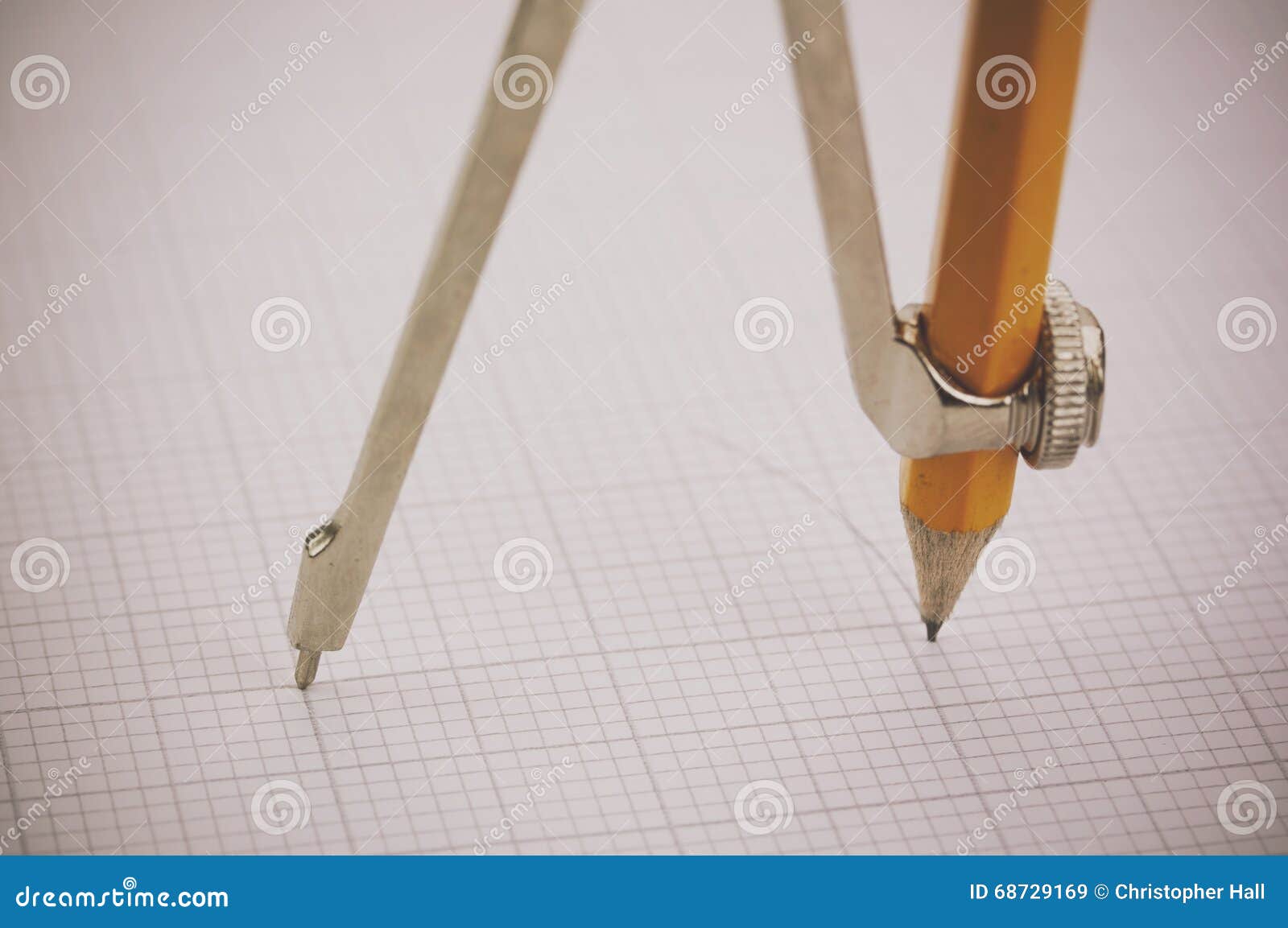 Close Up of a Compass on Graph Paper Stock Image - Image of instrument ...