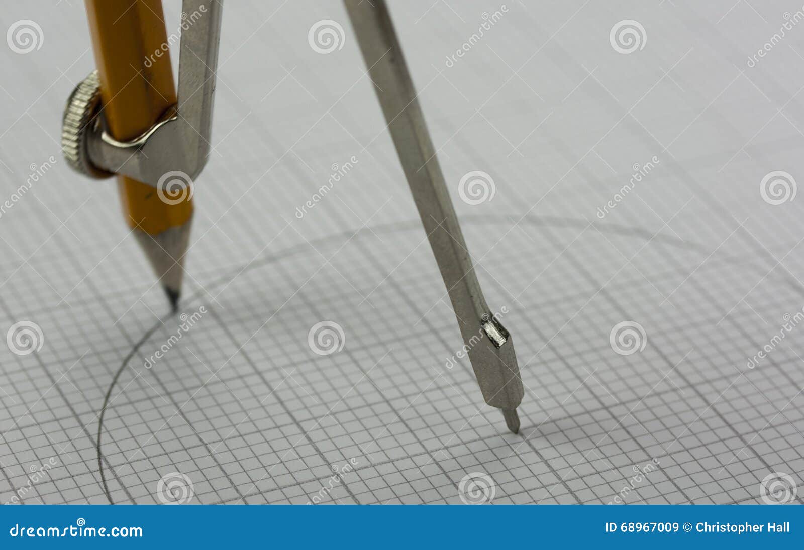 Close Up of a Compass on Graph Paper Stock Image - Image of measure ...