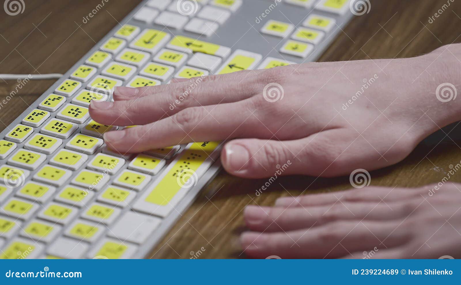 Close-up of a Computer Keyboard with Braille. a Blind Girl is Typing ...