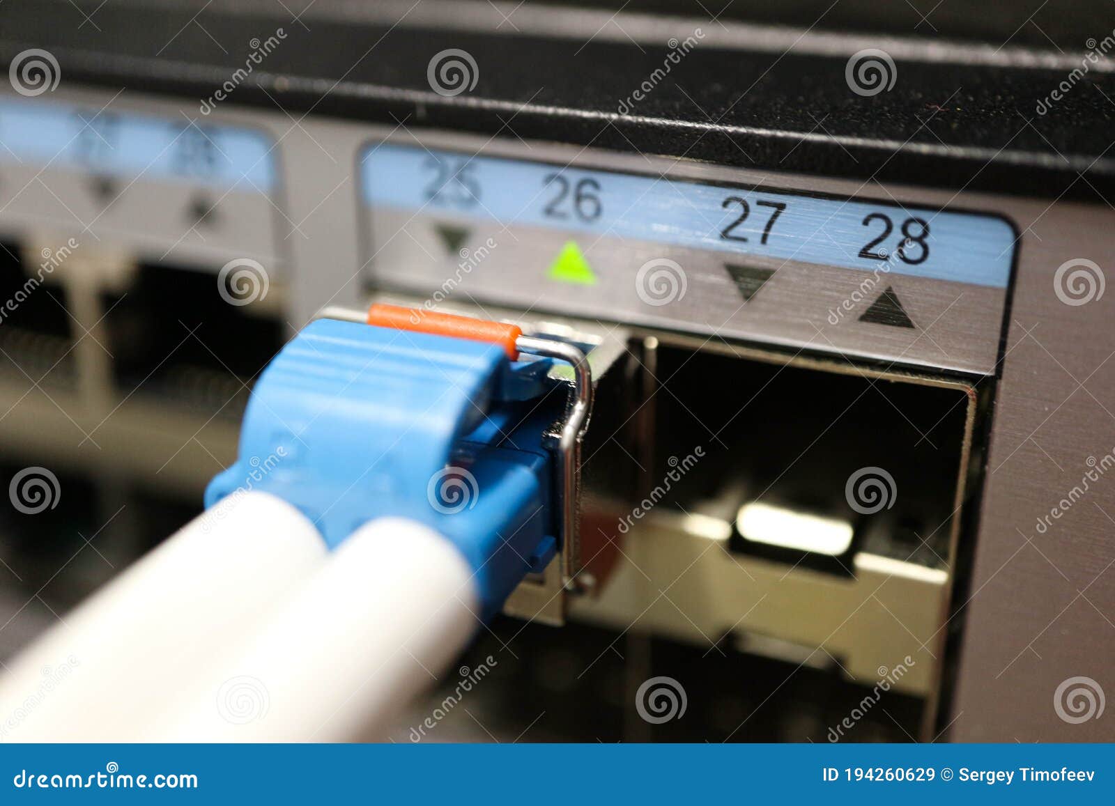 Close Up of a Computer Network Fiber Optic Cable Connected To a Switch ...