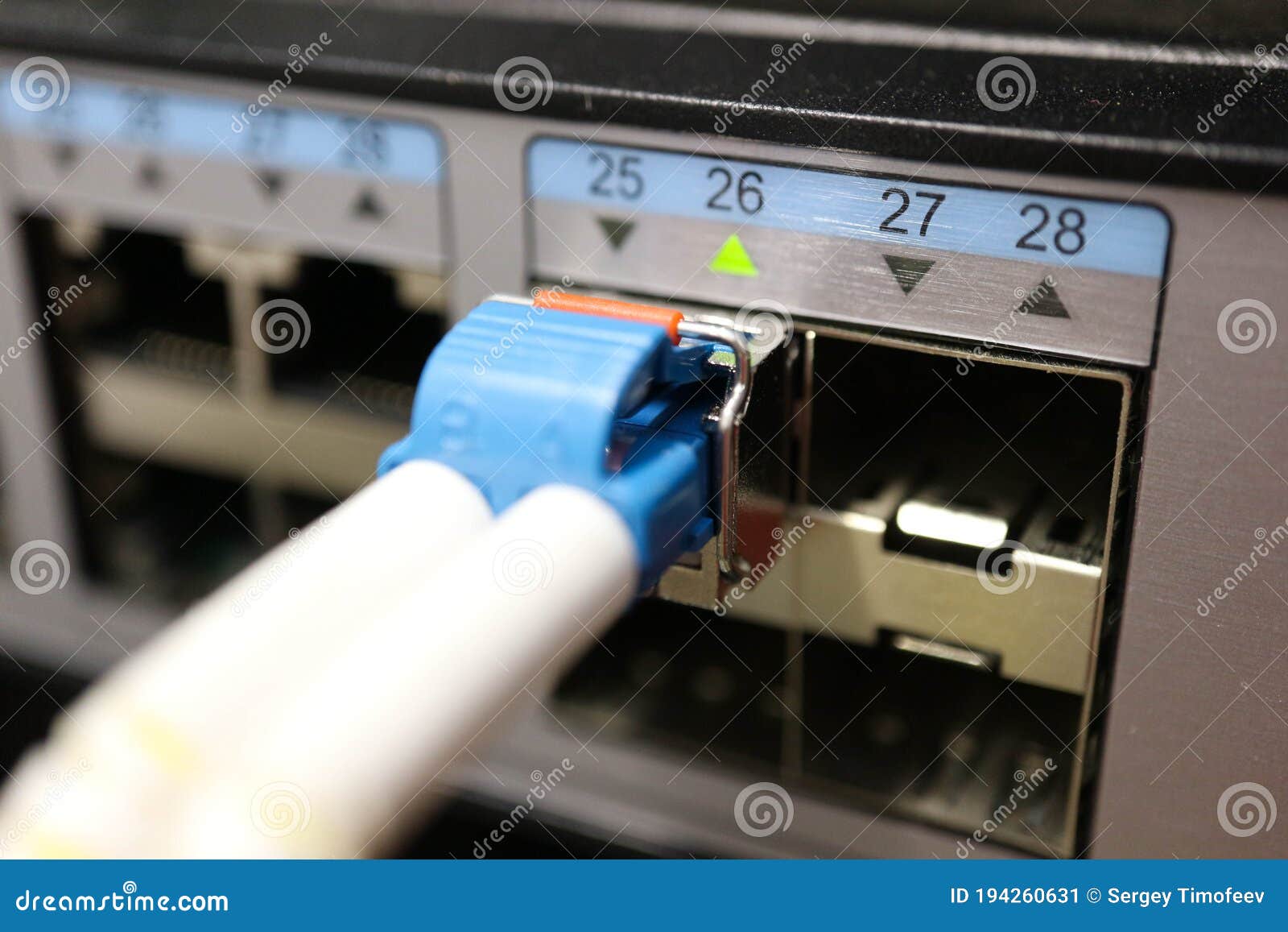Close Up of a Computer Network Fiber Optic Cable Connected To a Switch ...