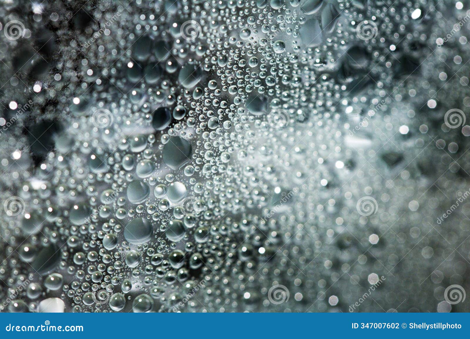 CLose Up of Condensation Bubbles and Marks on a Window Water Background ...