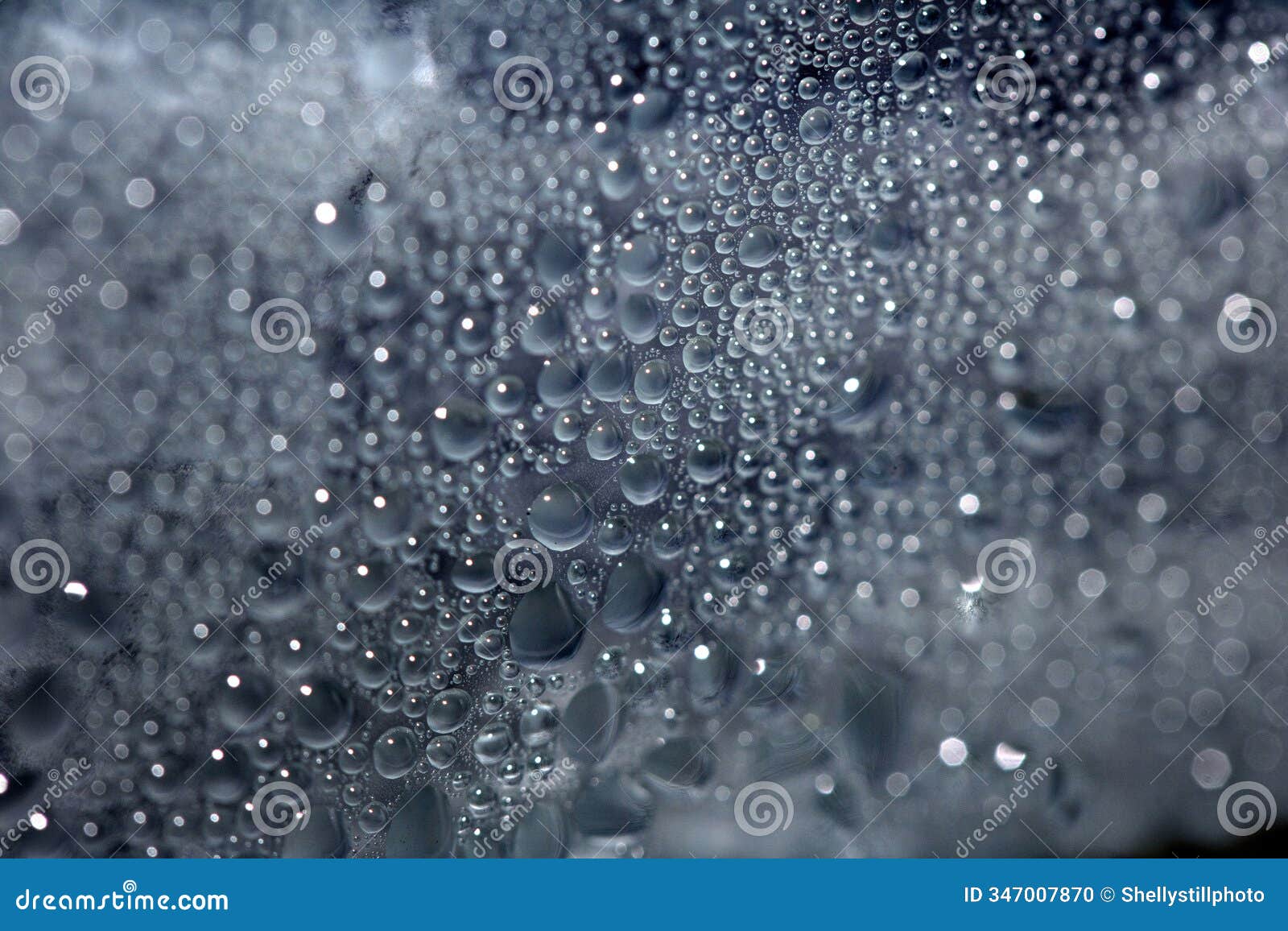 CLose Up of Condensation Bubbles and Marks on a Window Water Background ...