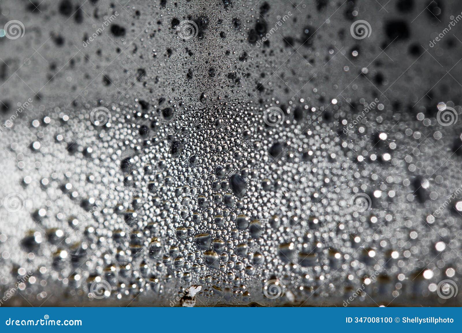 CLose Up of Condensation Bubbles and Marks on a Window Water Background ...