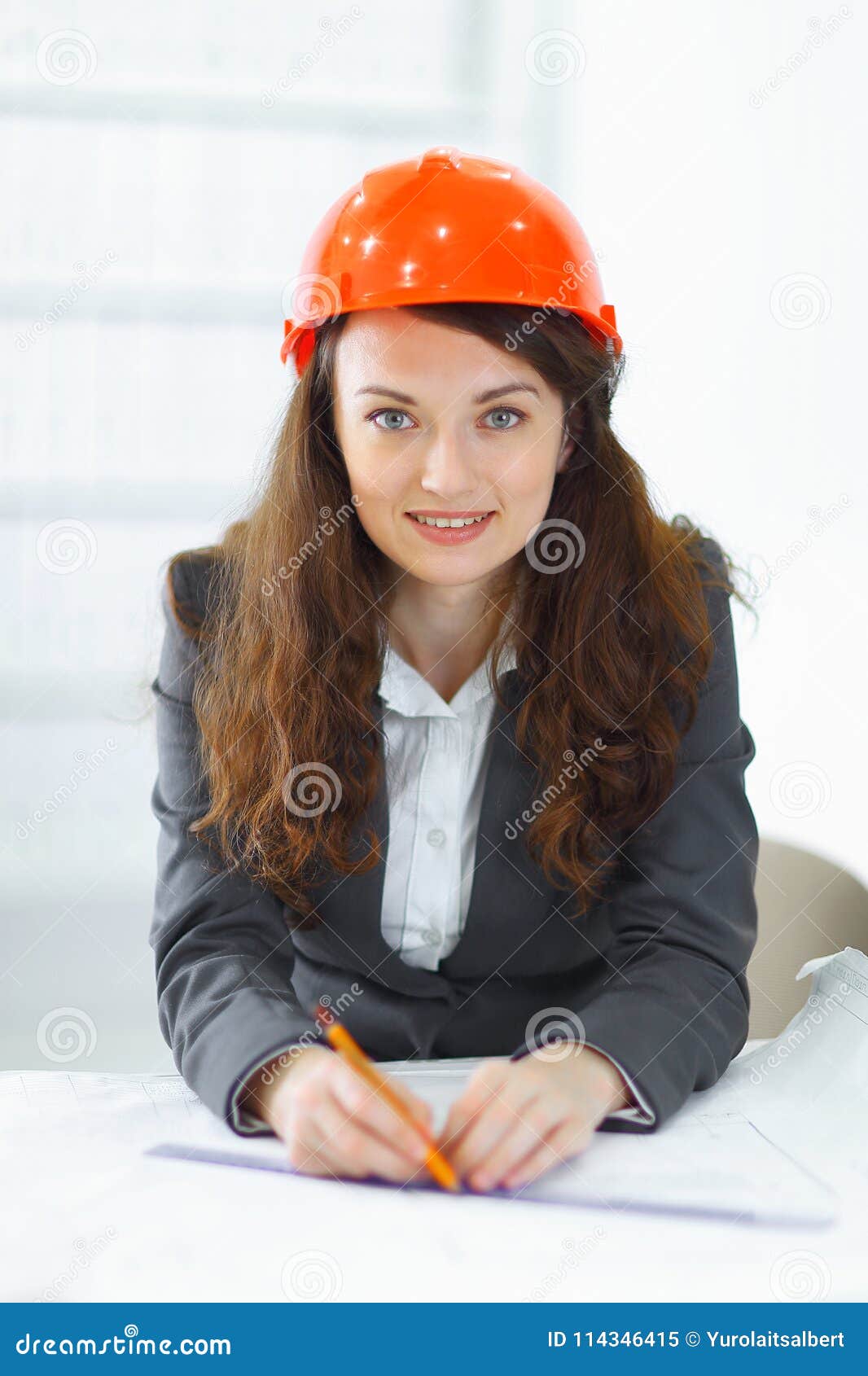 Close-up of Confident Architect Female in Casual Wear Working on Desk ... Close-up of Confident Architect Female in Casual Wear Working on Desk ...