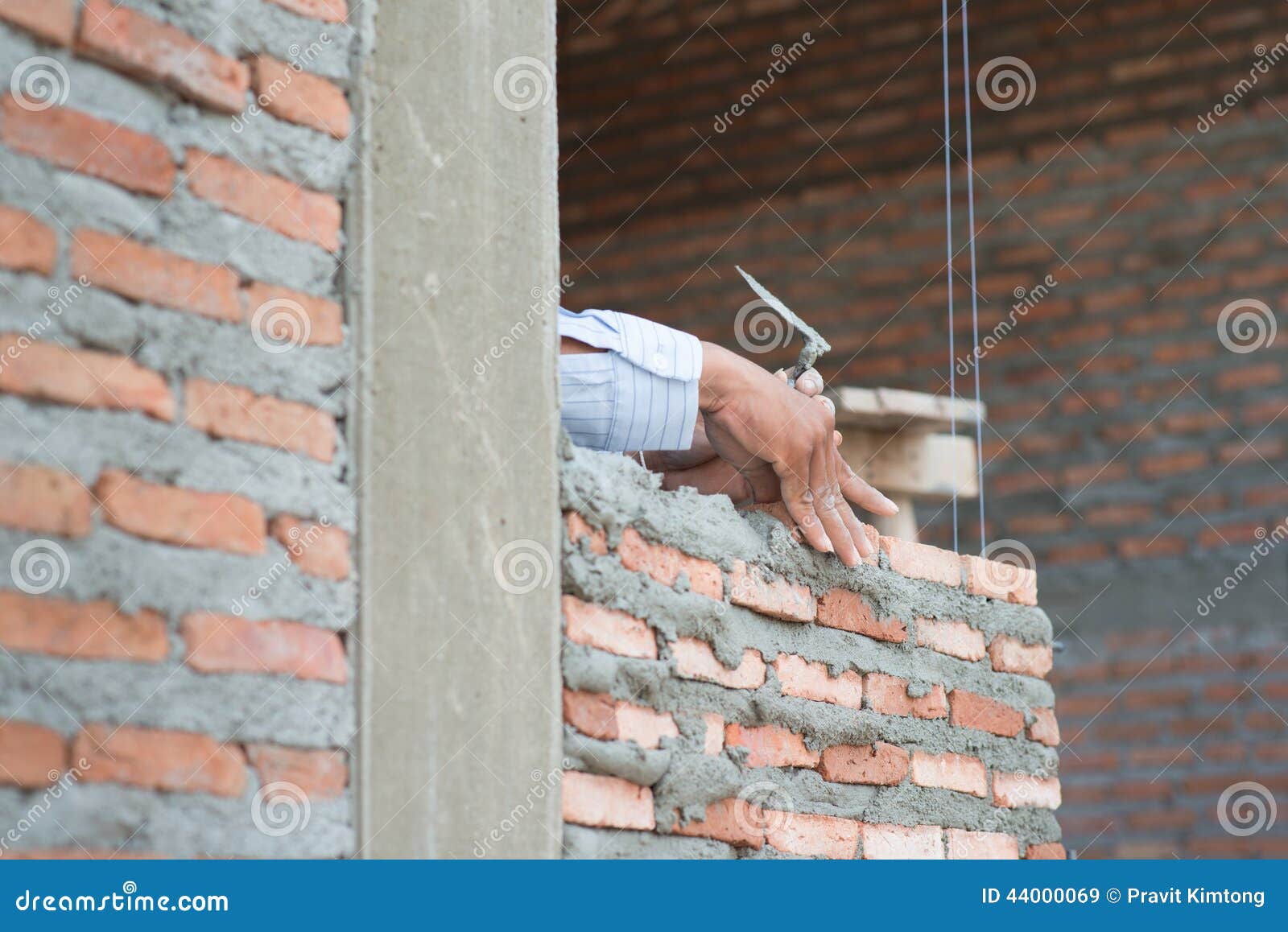 Close-up of Construction Process Mason Work with Brick Installation ...