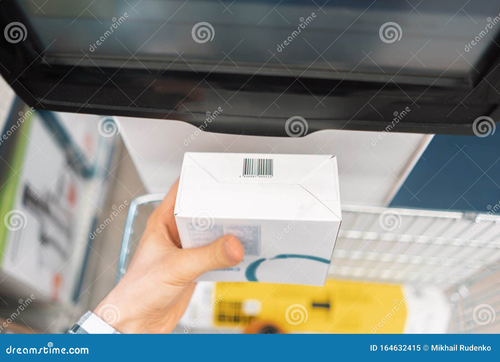 Close Up Consumer Check the Price in the Store Using Rfid Scanners ...