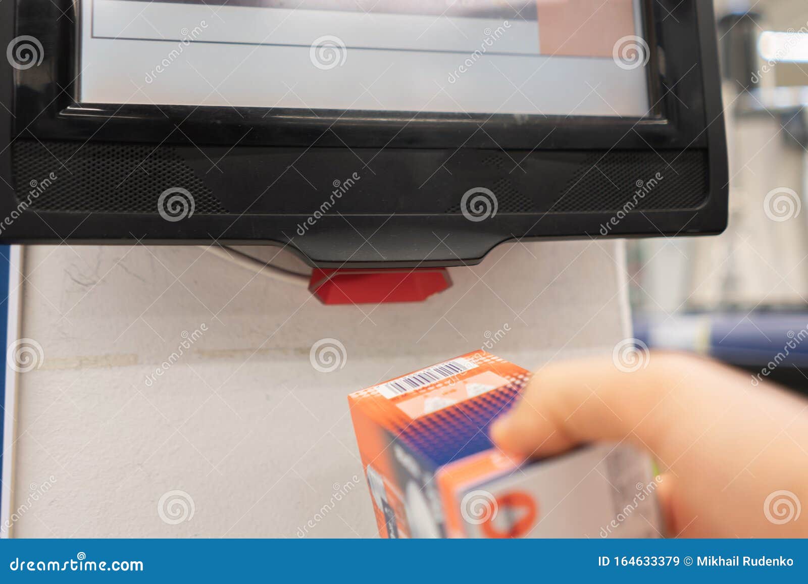 Close Up Consumer Check the Price in the Store Using Rfid Scanners ...