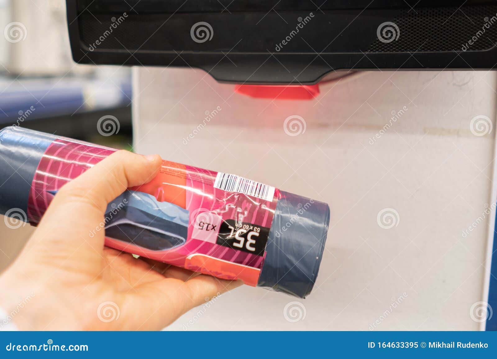 Close Up Consumer Check the Price in the Store Using Rfid Scanners ...