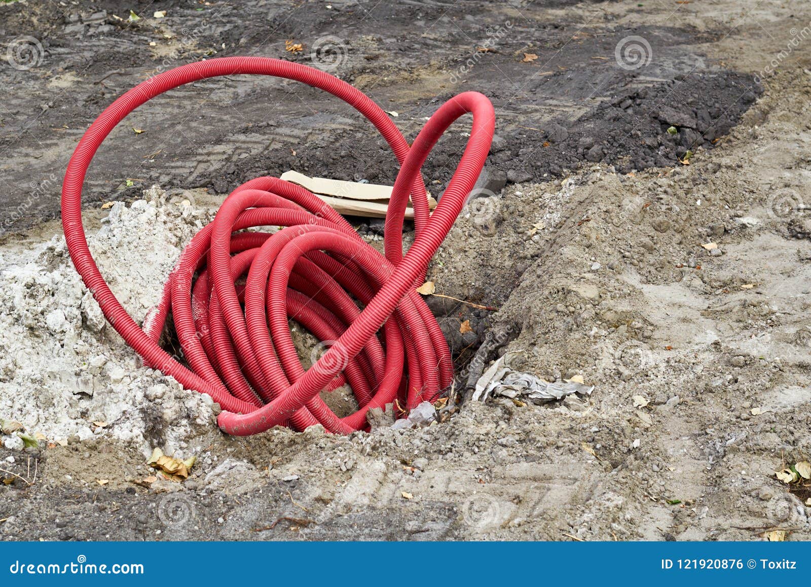 Close Up of Corrugated Red Drain Pipe Lays on the Ground. Stock Photo ...