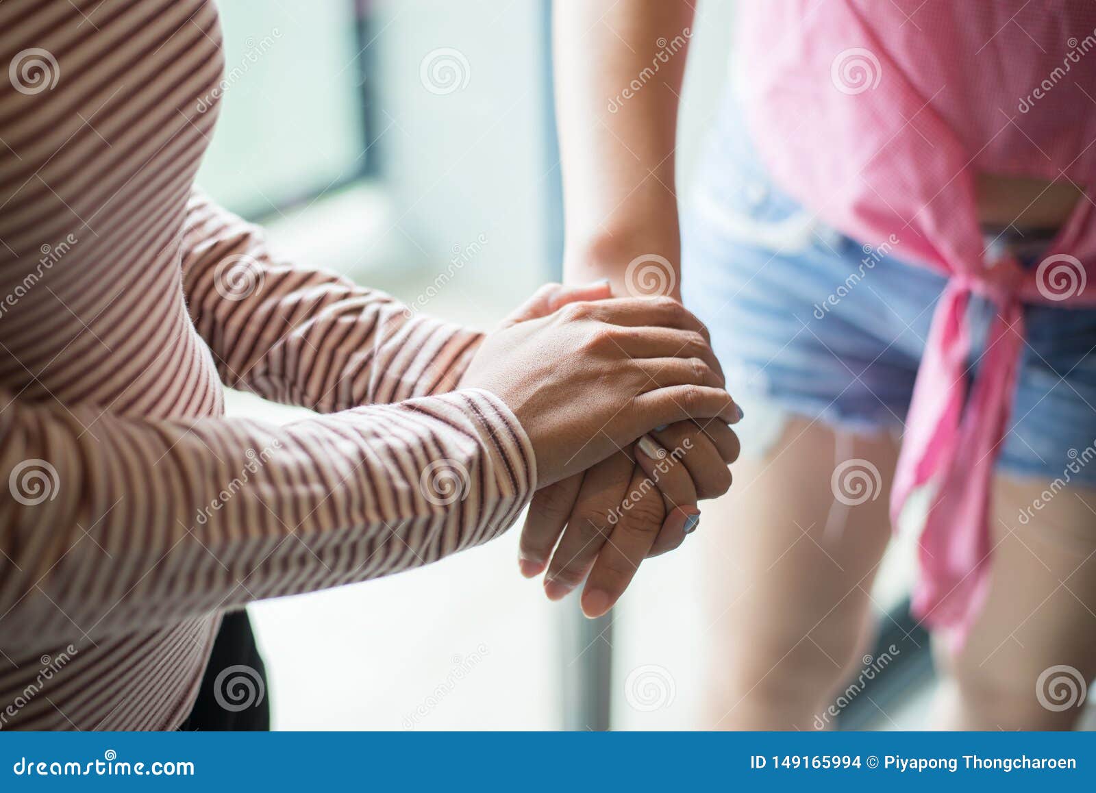 Close Up of Couple Woman Friend Holding Hands and Caring Supporting ... Close Up of Couple Woman Friend Holding Hands and Caring Supporting ...