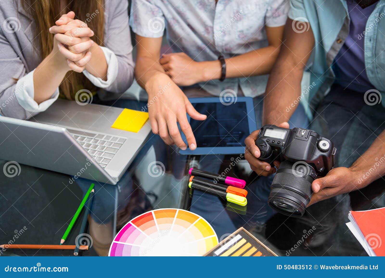 Close Up of Creative Business People with Digital Camera Stock Photo ...