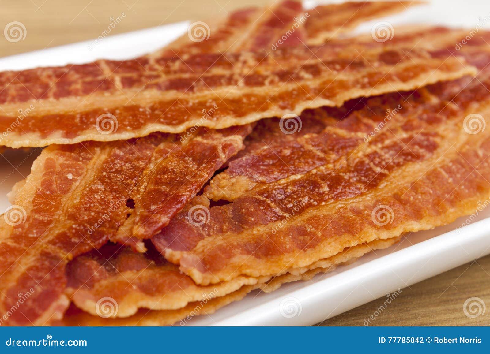 Close Up of Crispy Bacon Rashers on a Platter Stock Photo - Image of ...