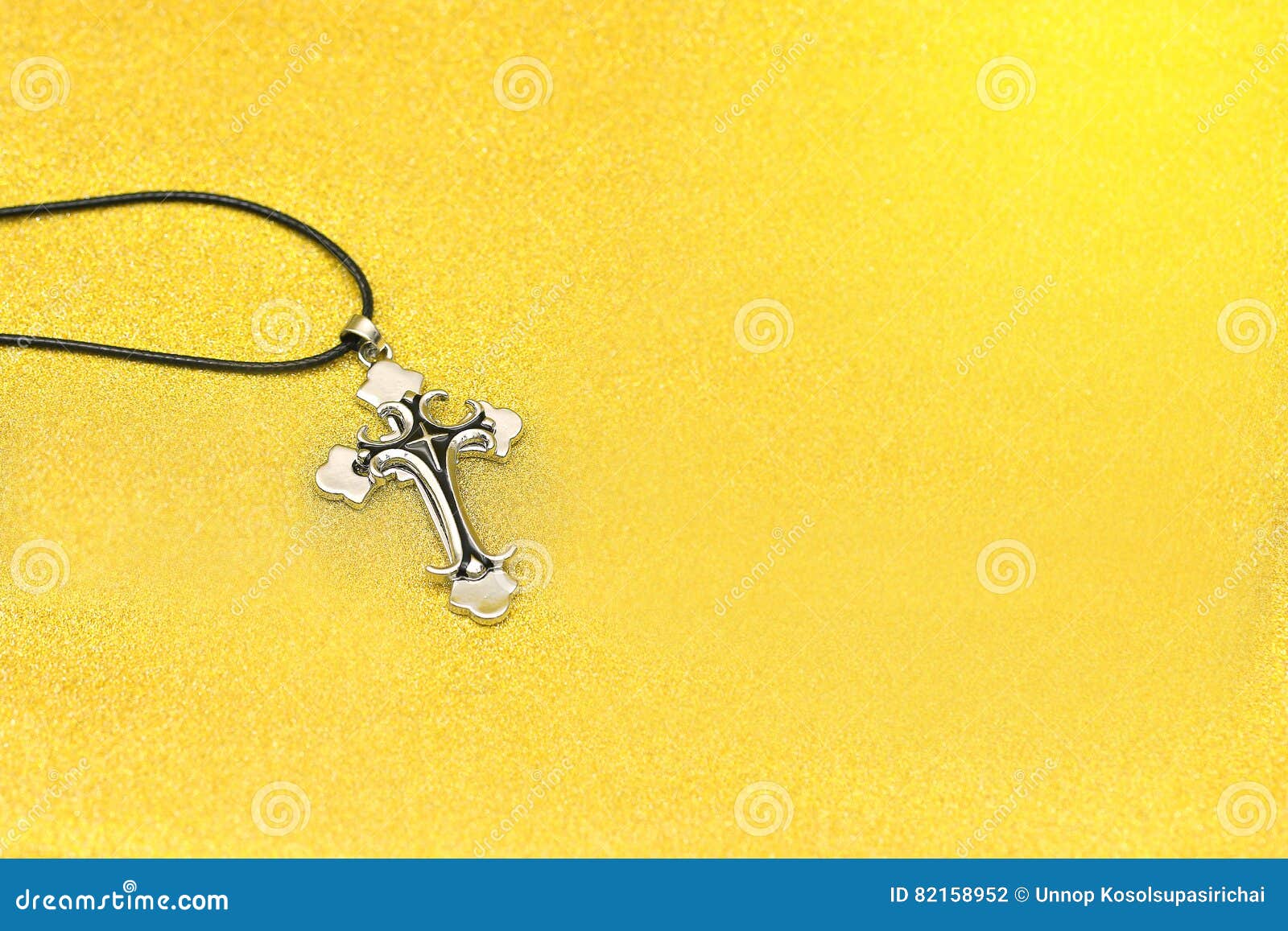 Close Up Cross Pendant on Glitter Background with Copy Space Stock ...