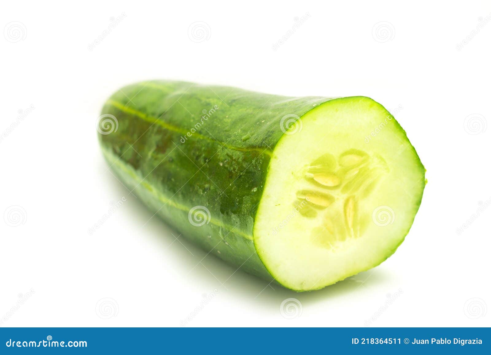 Long cucumber cut in half stock image. Image of green - 218364511