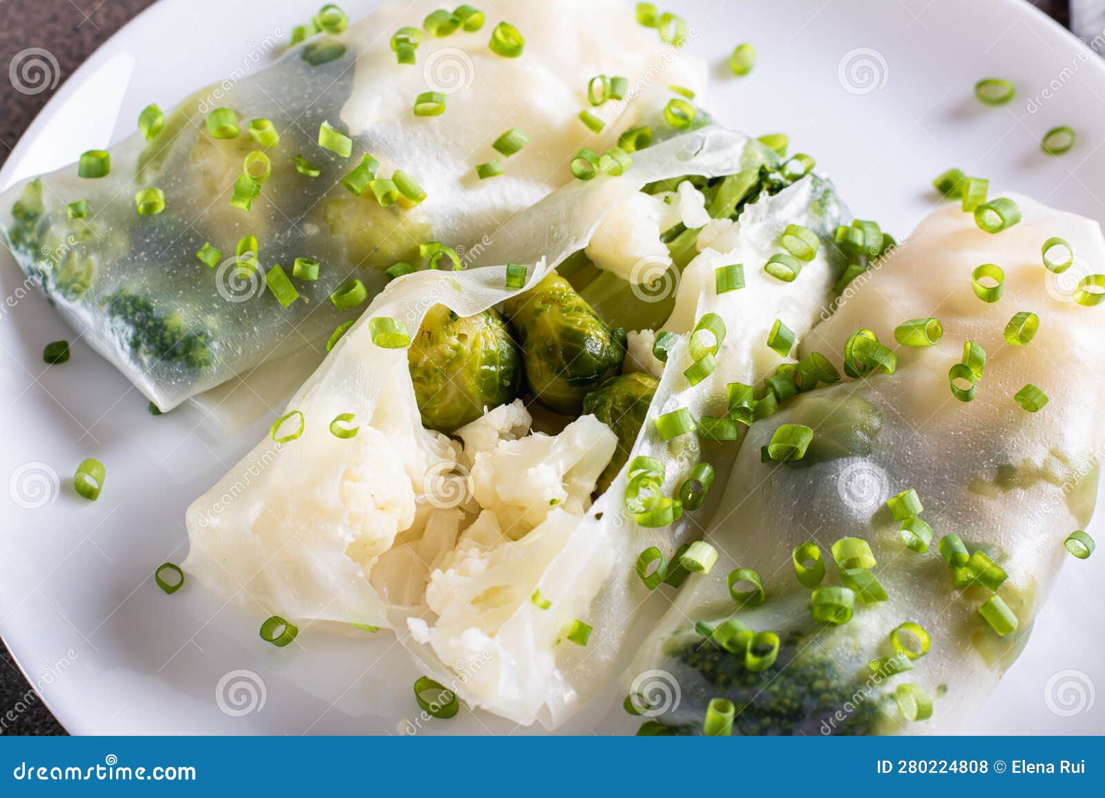 Close-up of Cut Spring Roll with Broccoli, Cauliflower and Brussels ...