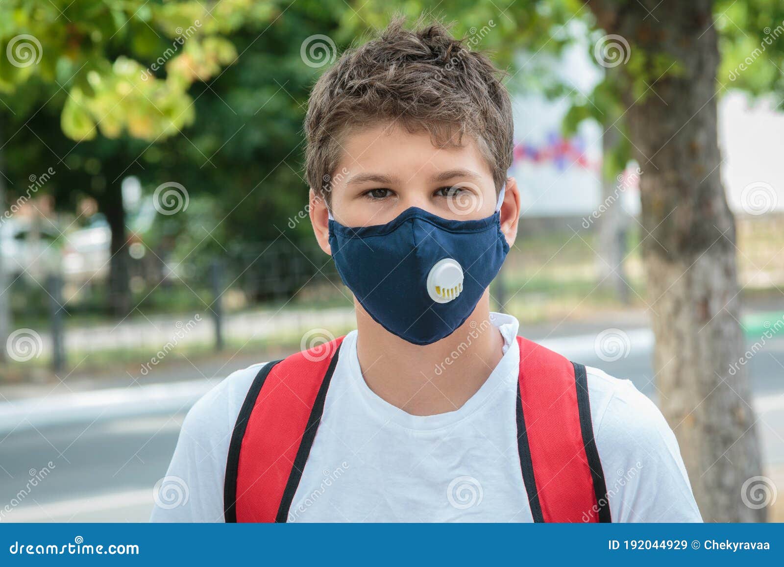 Close Up Cute Young Boy with Protective Mask on His Face. Teenager in ... Close Up Cute Young Boy with Protective Mask on His Face. Teenager in ...