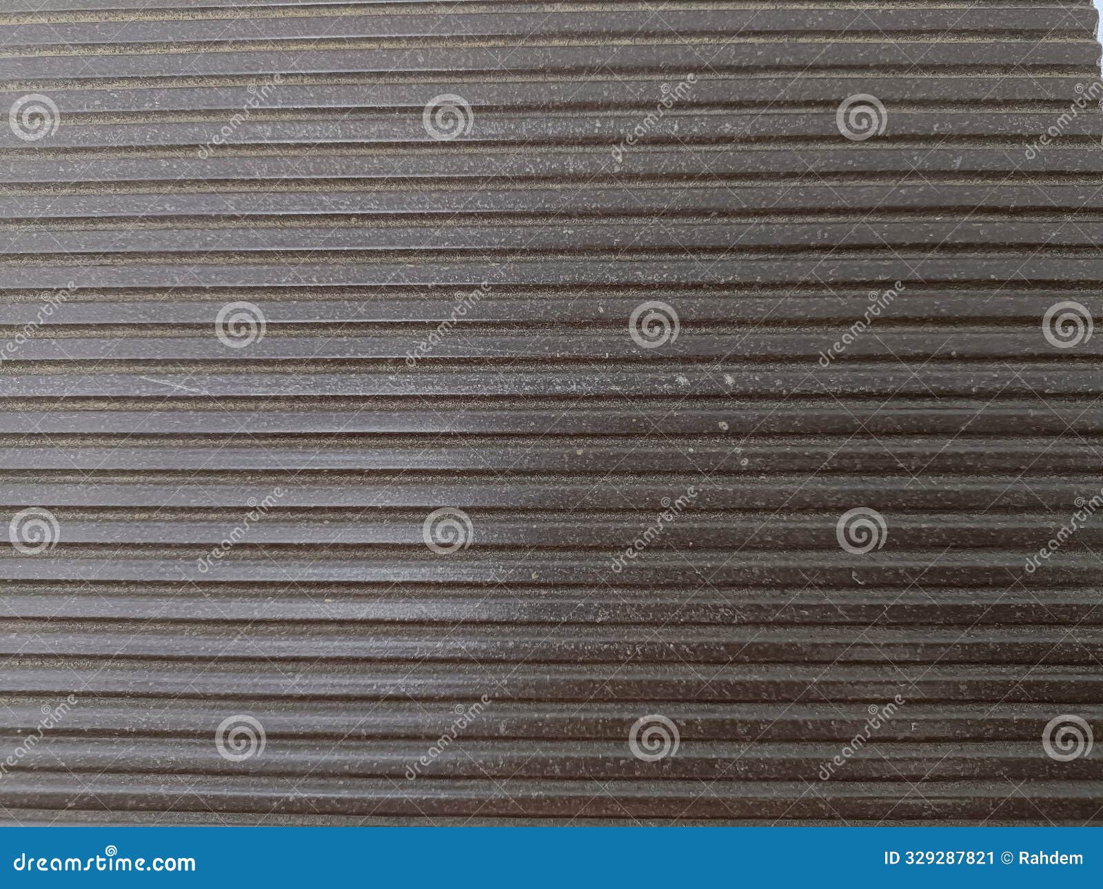 Close-Up of Dark Brown Composite Decking Panel with Grooved Texture ...