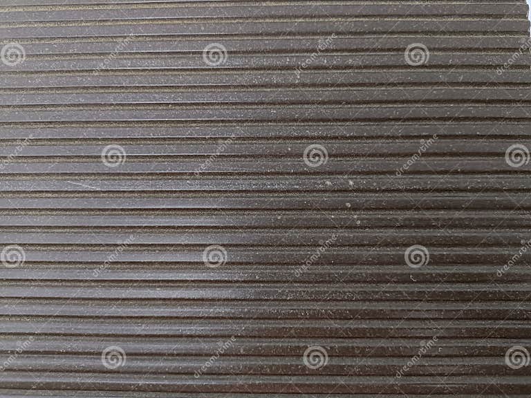Close-Up of Dark Brown Composite Decking Panel with Grooved Texture ...